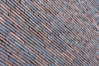 Bakstenen verwerken met metselverband in uw gevel