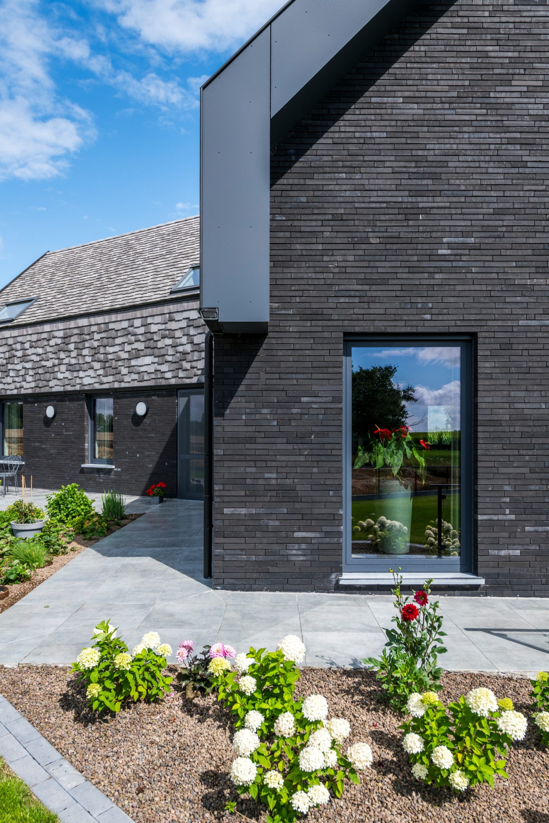 Villa moderne sur parcelle cunéiforme à Avelgem